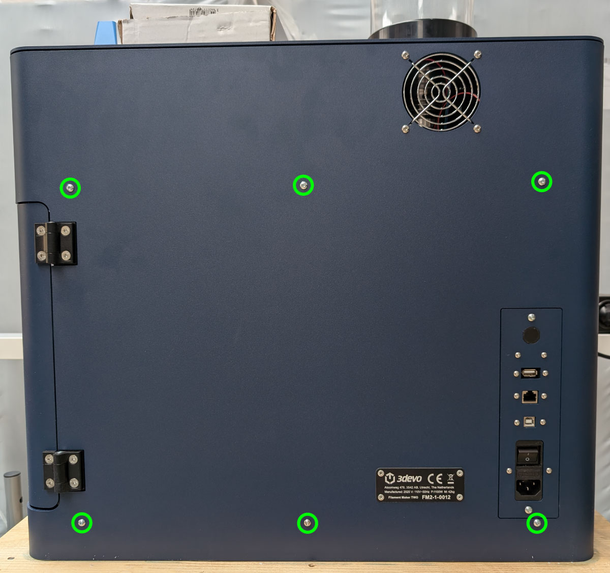 Remove the back panel of the Filament Maker TWO